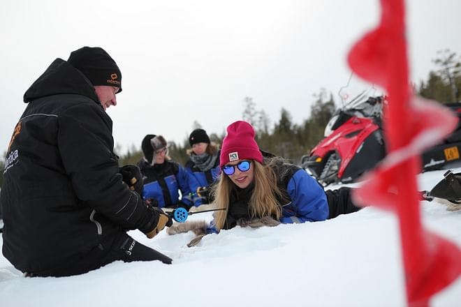 Lappish Lunch Break – Snowmobiling, ice fishing and tasty food - Elämys ...